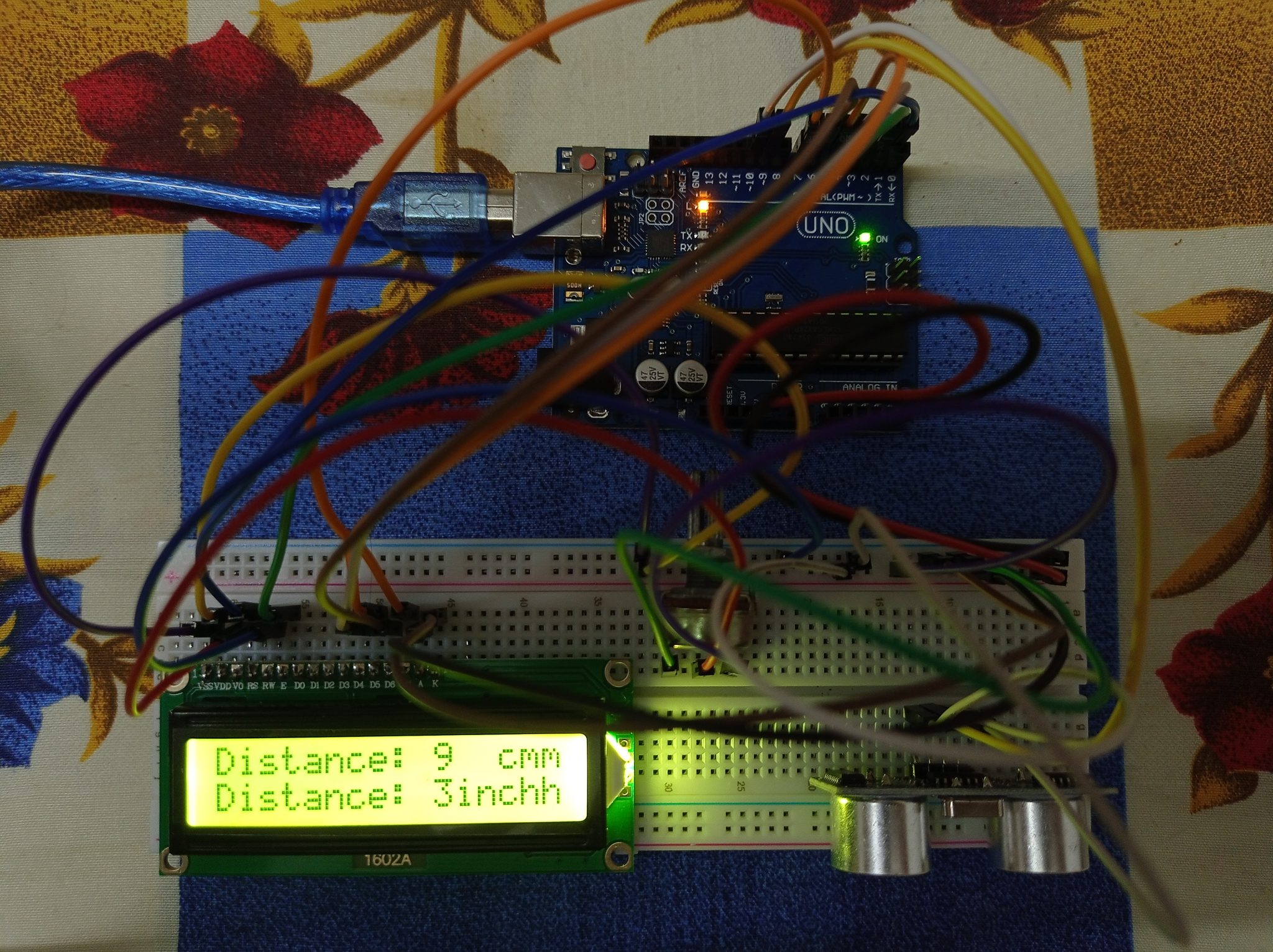 Display Distance out on LCD with Arduino Uno - Prgmine