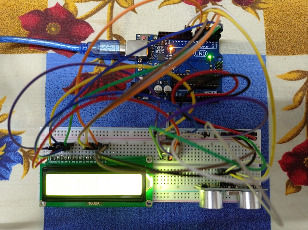 Display Distance out on LCD with Arduino Uno - Prgmine